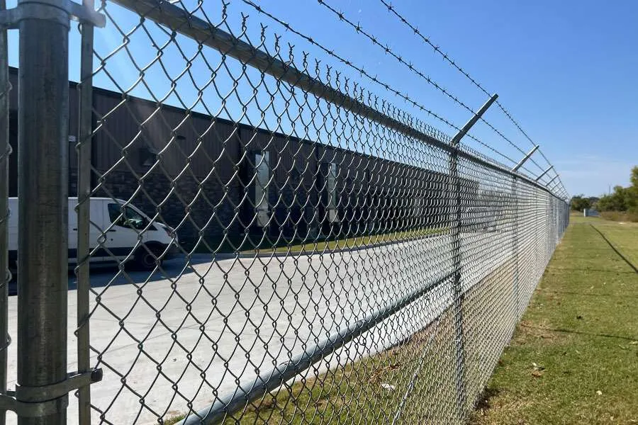 Car Dealership Fence Installation - Empire Fence